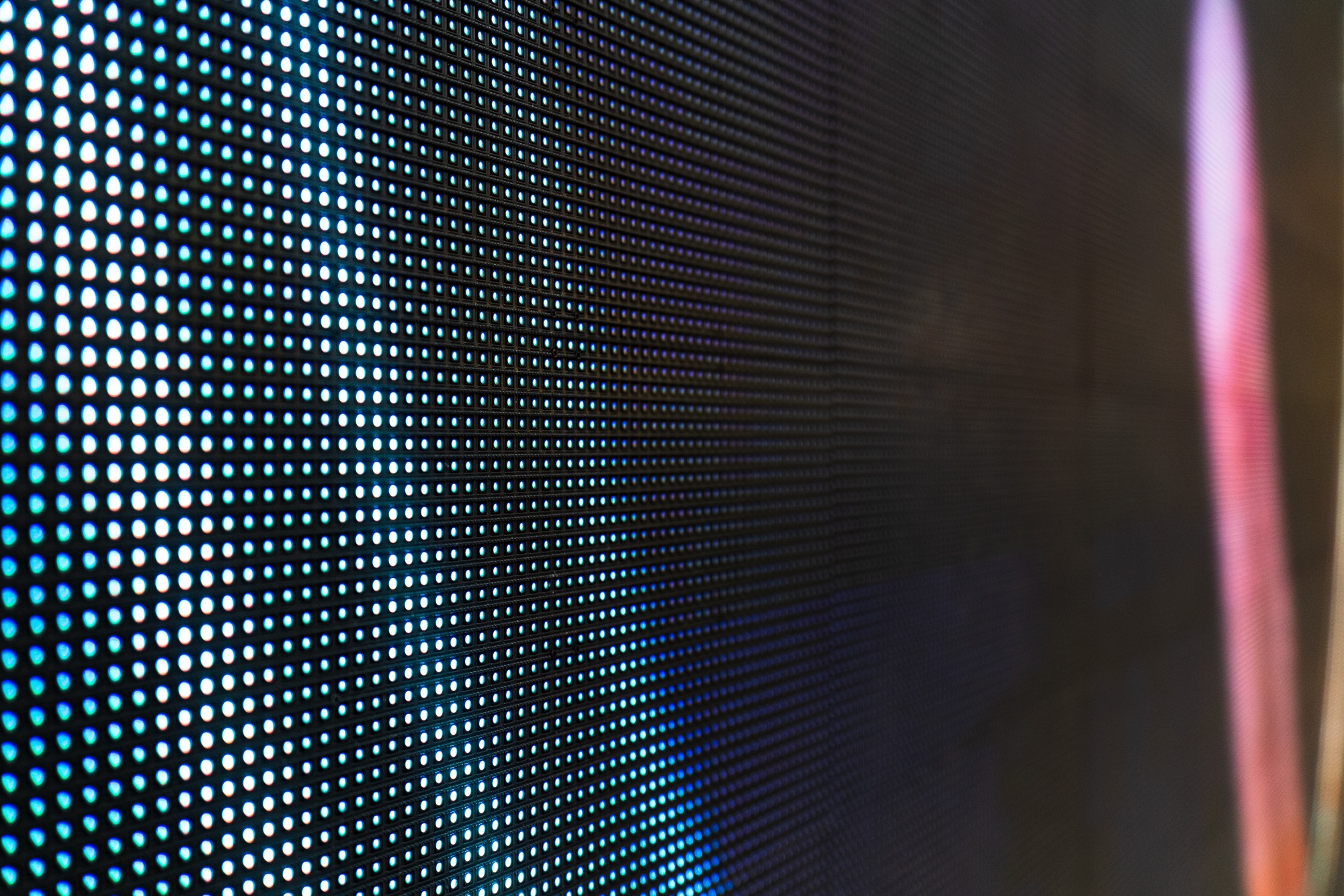 Abstract Close up Bright colored LED SMD video wall abstract background ...